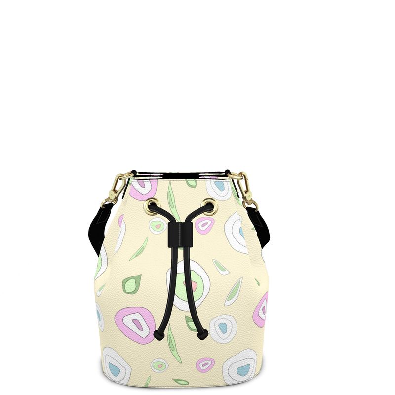 Pastel yellow, pink, patterned bucket bag